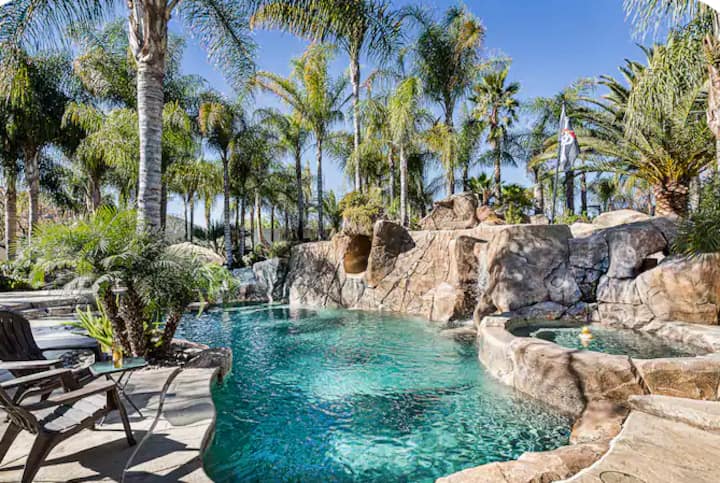 The Tiki Palms Oasis | Pool, Waterfall & Slide - Menifee, CA