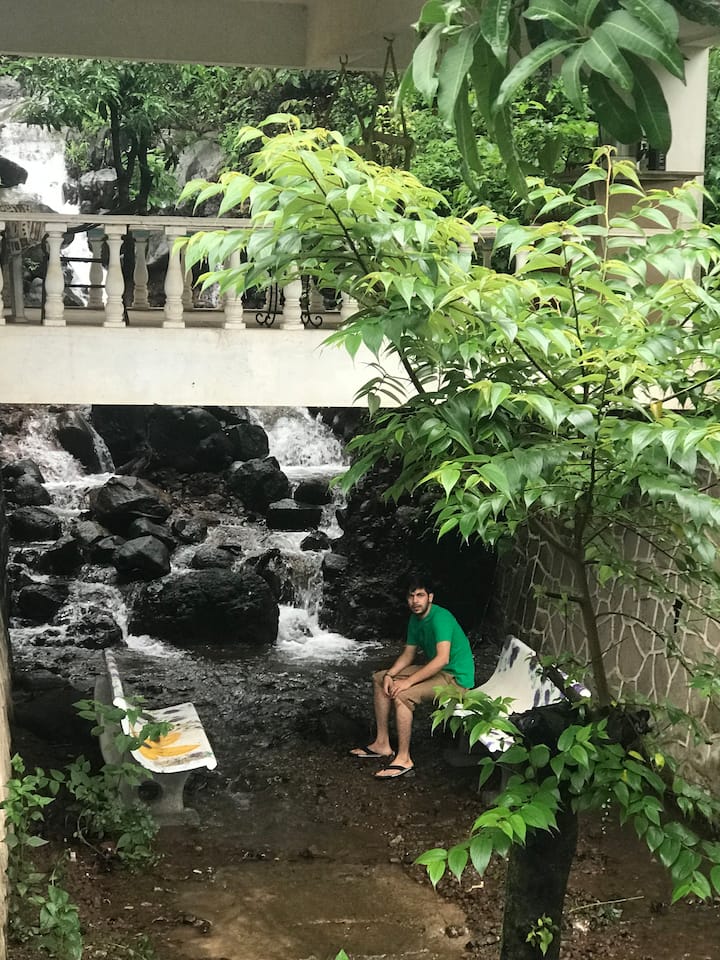 The Artists’ Den.
Private Waterfall/ Shared Lounge - Khopoli