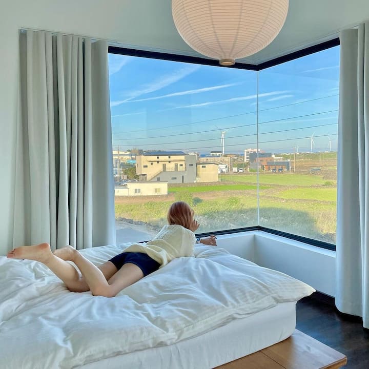 월정리 감성숙소 | 제주 돌담 너머 파노라마 뷰 & 자쿠지 | 해변 도보 5분 - Ciudad de Jeju