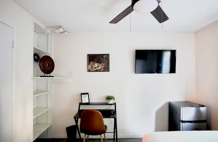 Modern Guest Bedroom With Desk, Tv & Mini Fridge - Fresno