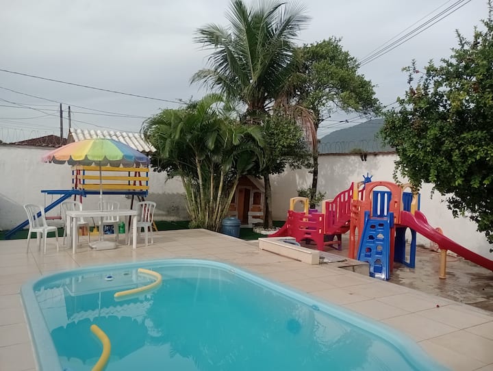 Casa Esquina Com Piscina ( 13) 997437766 - Praia Grande