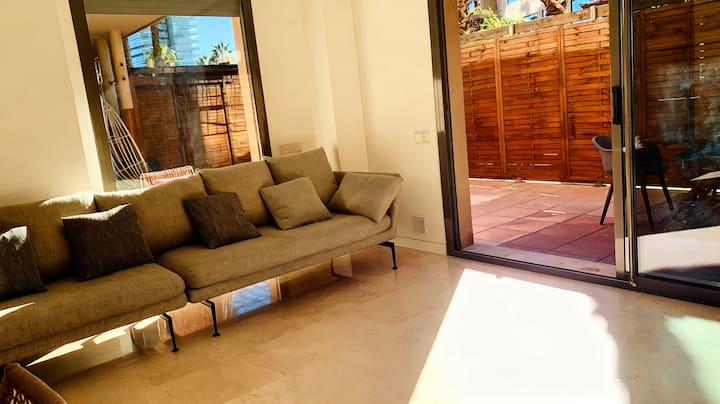 Beach Apartment · 50m² Terrace · Pool & Gym -