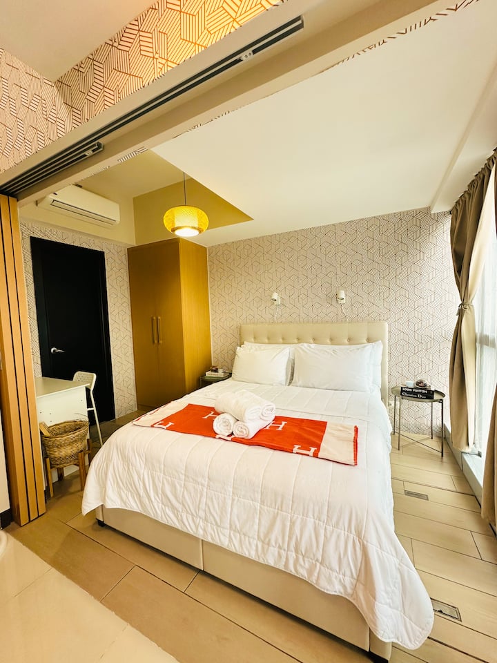 Stylish 1br Uptown Escape- Walk To Everything - Pasig