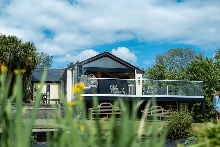 Luxury Lakefront Escape With Hot Tub - Fonmon Castle the home of Jurassic Wales - Dinosaur Attraction.