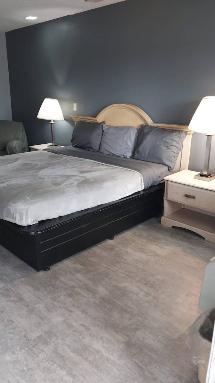 (114) King Bed Hotel Room - Jackson, MS