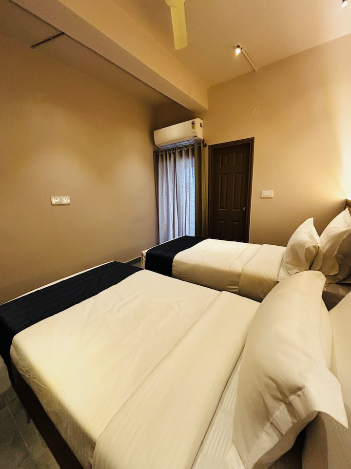 Twin Retreat With Balcony | Comfort & Cozy - India