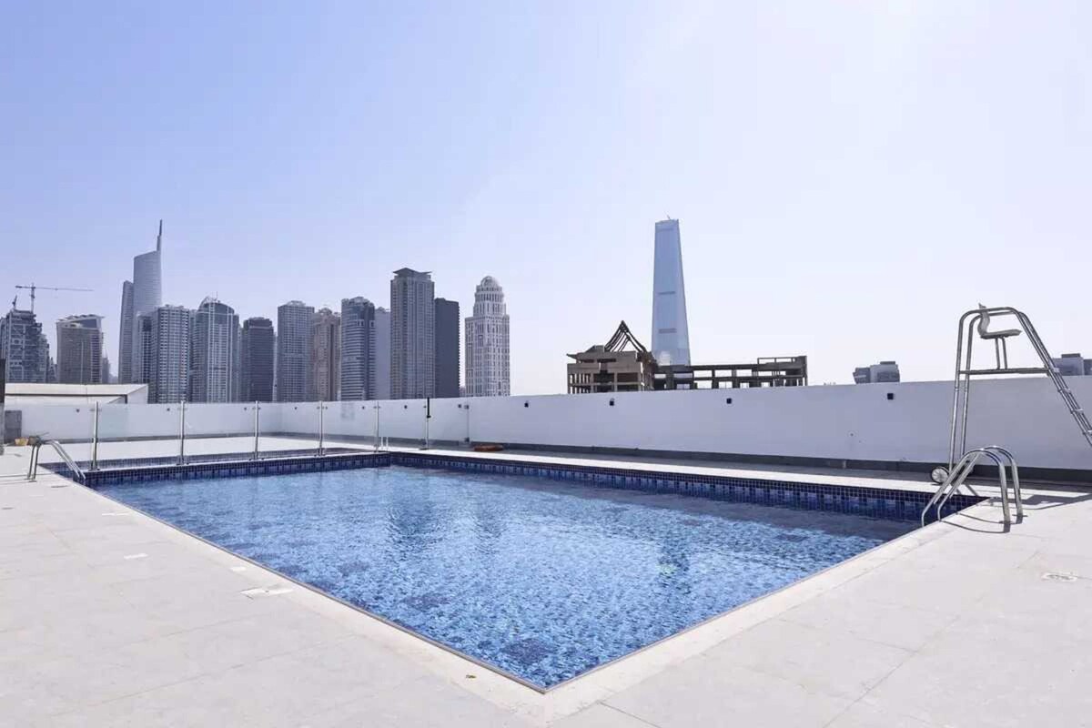 Stylish 2BR | Pool + Gym | Close to JLT & SZR - Serviced apartments for ...