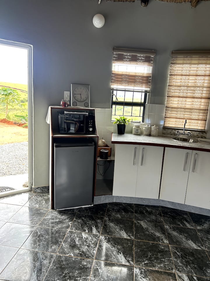Swati Rondavel With River View - Eswatini
