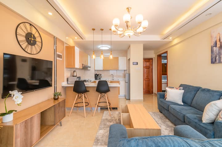 Chic Urban Getaway: Pool, Gym, Nextgen Mall Access - Kenya