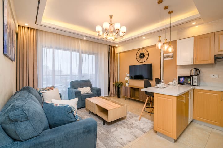 Chic Urban Getaway: Pool, Gym, Nextgen Mall Access - Kenya