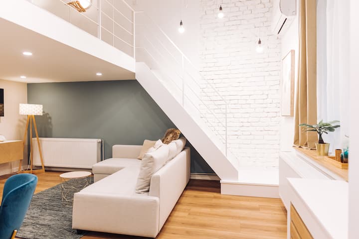 Savor The Airy Vibes At A Chic Loft With Toucan Wallpaper - Budapest