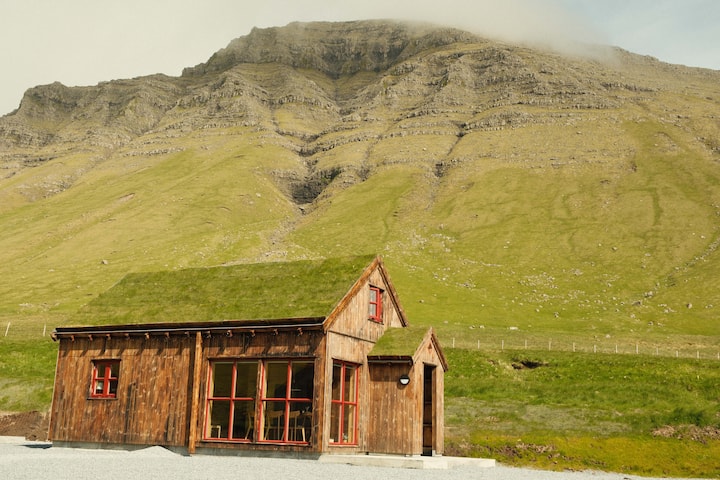 Turf Cottage In Gásadalur Surrounded By Mountains - Faroe Islands