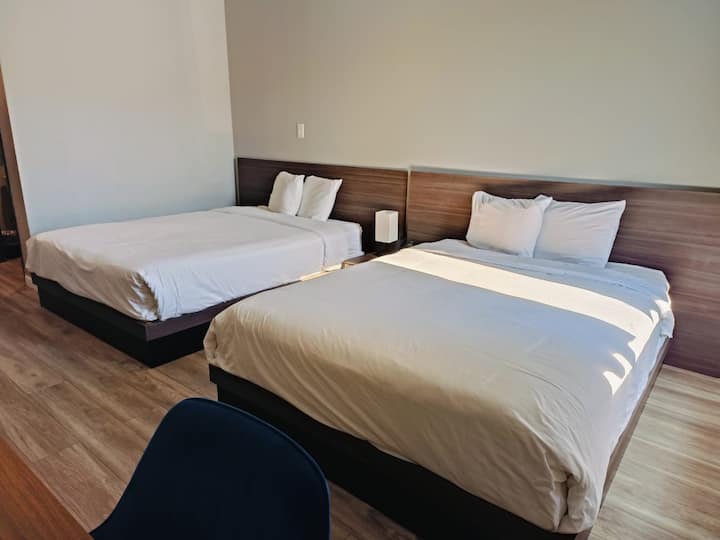 2 Queen Beds Non-smoking | Champion Inn Motel - Cleveland, TX