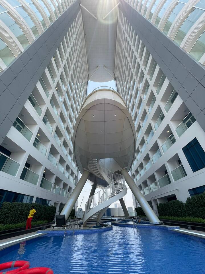 Modern Studio With Balcony Views & Pool Access - Dubai