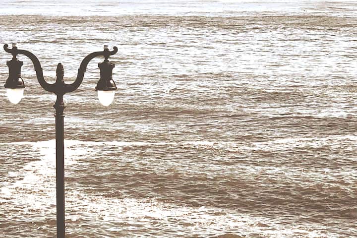 Boardwalk Front Looking Over The Boards. - Atlantic City, NJ