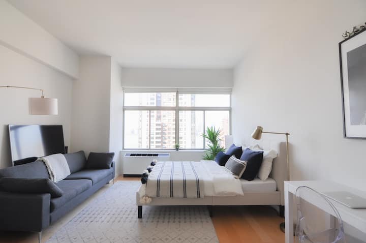 Water & City Views | Luxury Building Studio - New York City