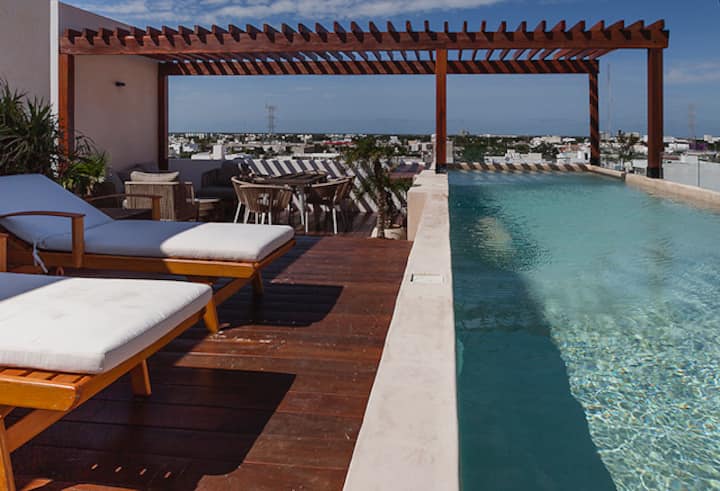 Beachside Haven: Modern 2br Condo, W/rooftop Pool - Playa del Carmen