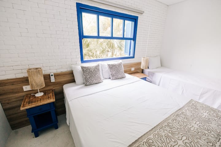 Pousada Villa Santô - Suíte Luxo Família Térreo - Guarujá