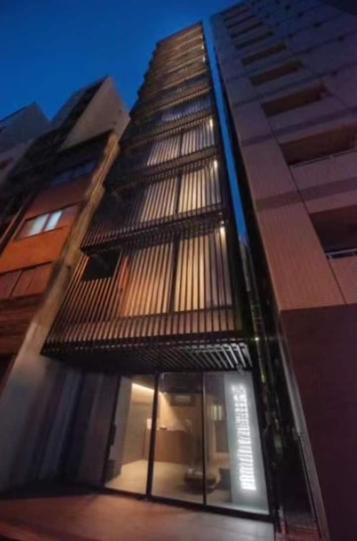 大きなソファのあるスタイリッシュなお部屋 - Ginza