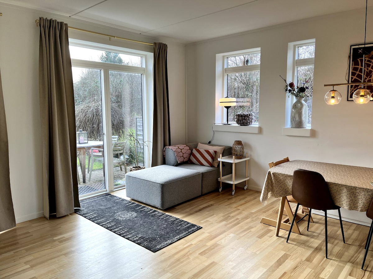 End row house with large garden close to forest and water - Houses for ...