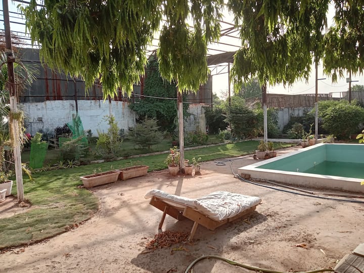 Frangipani Farmstyle Rustic Nest:homeawayfromhome. - Ahmedabad