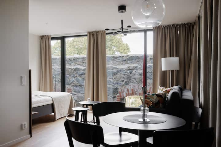 Sleek Studio Set Amid Ancient Walls - ストックホルム