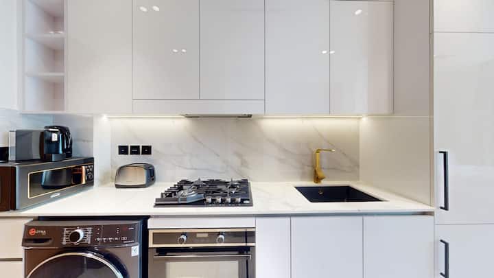 Bright & Modern Studio Retreat L Free Gym & Pool - Dubái