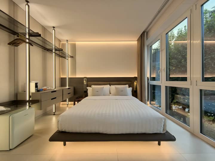 Chambre Deluxe  •  Amona By Comorooms - Côme