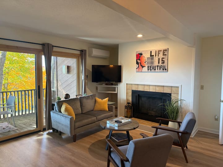 Cozy Slopes Condo|view|fireplace - Torch Lake, MI