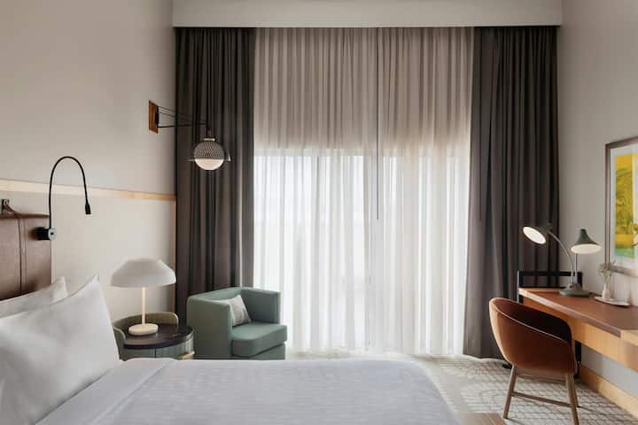 Nature-infused Guest Rooms & Art-filled Lobby - Racine, WI