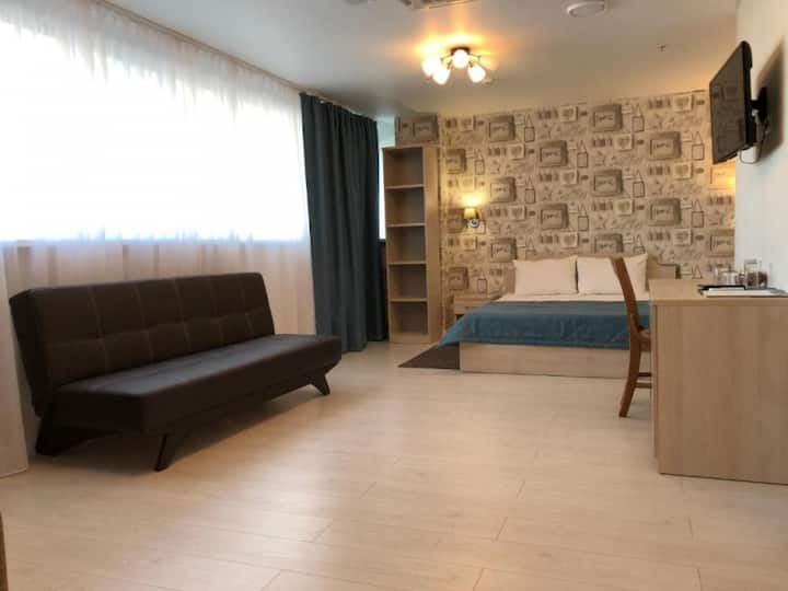 Family Room With Sofa. New City Inn - Moscow